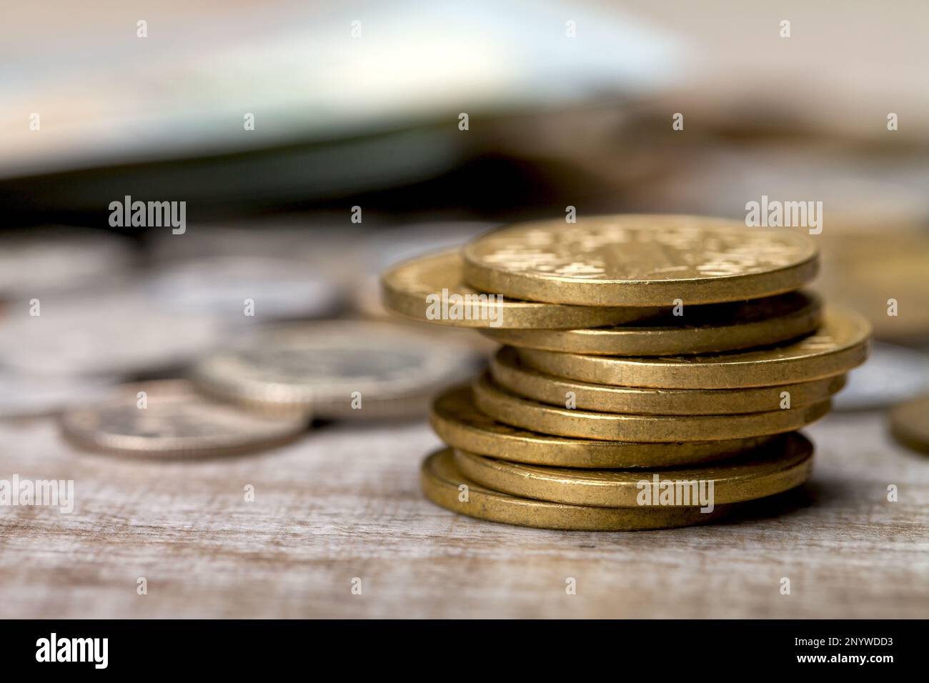 Pyramid of coins. Column of metal coins. The concept of saving Stock ...