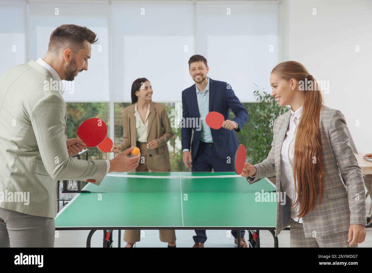 Group people playing tennis hi-res stock photography and images - Alamy