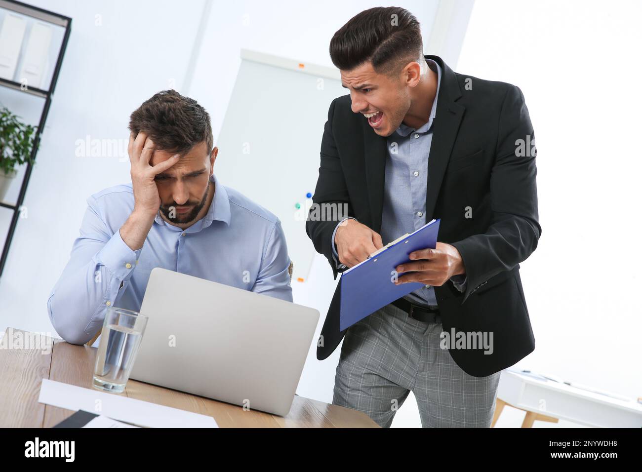 Boss screaming at employee in office. Toxic work environment Stock ...