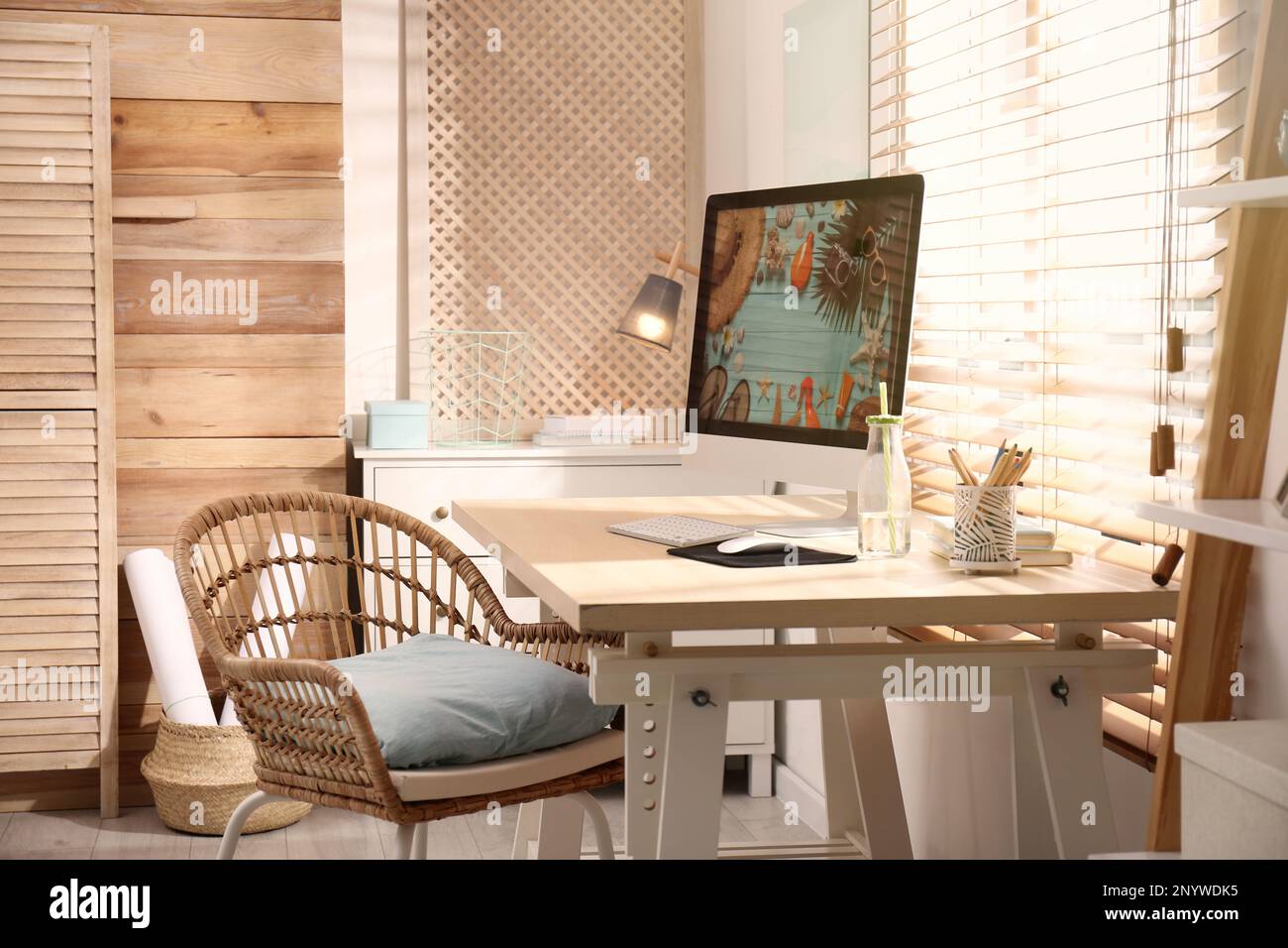 Comfortable workplace with modern computer near window. Interior design ...