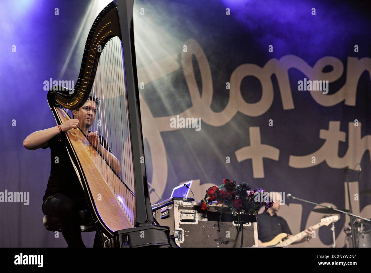 Tom Monger of Florence and the Machine performs during the 2010 Voodoo ...