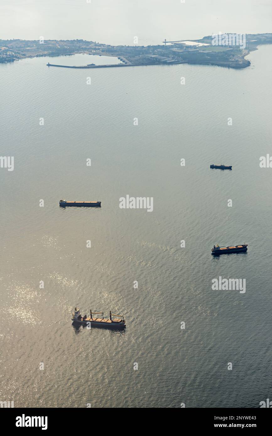 Merchant ships at anchor waiting for their turn to go up the Bosphorus ...
