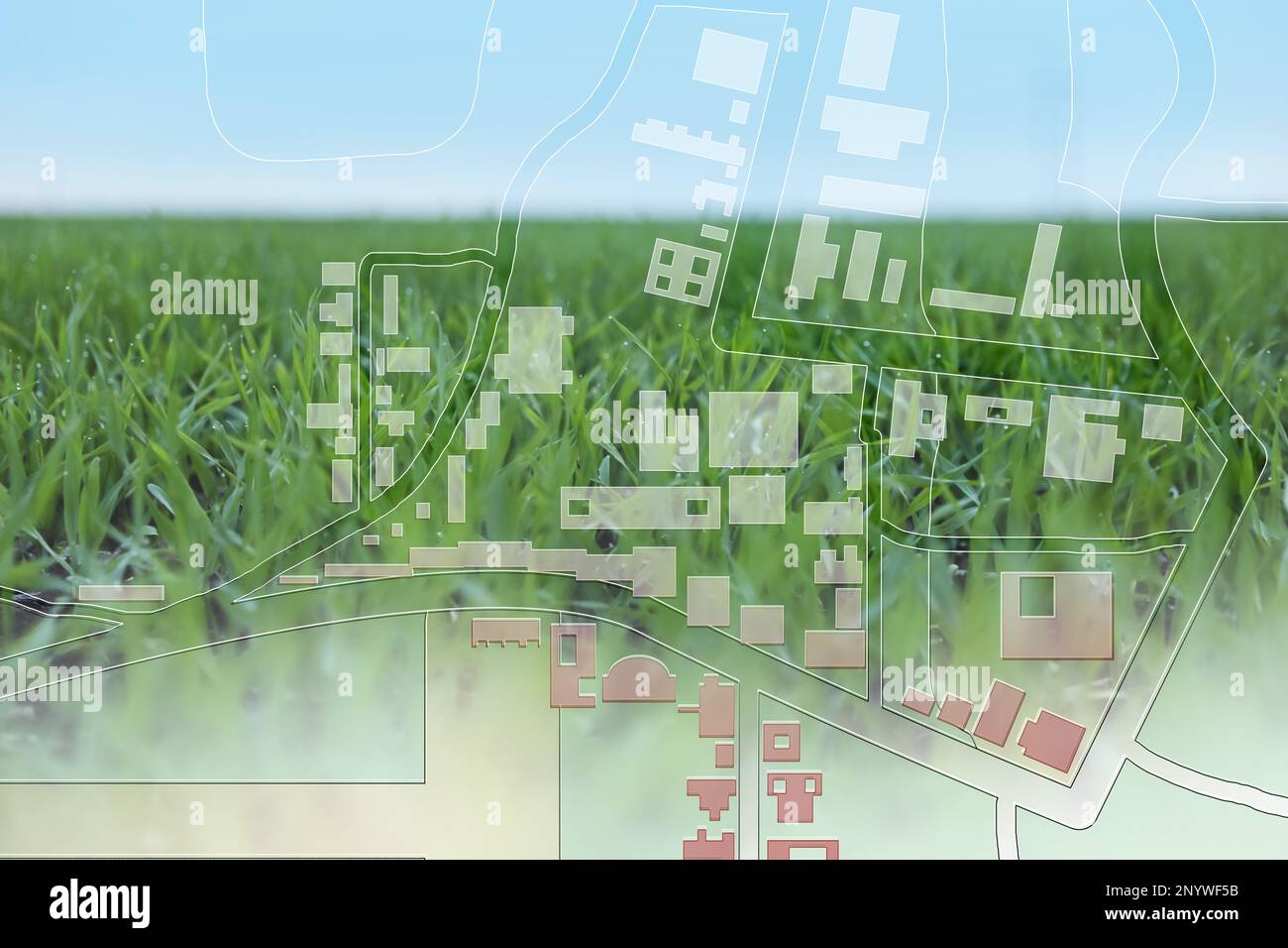 Double exposure of cadastral map and green field Stock Photo - Alamy