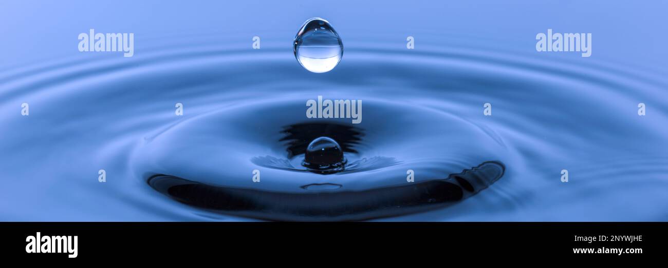 Drop splashing hi-res stock photography and images - Alamy
