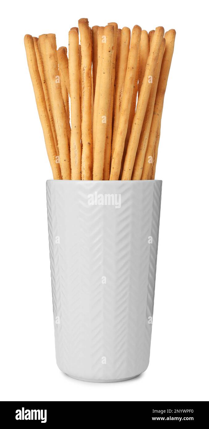 Delicious grissini sticks in glass on white background Stock Photo - Alamy