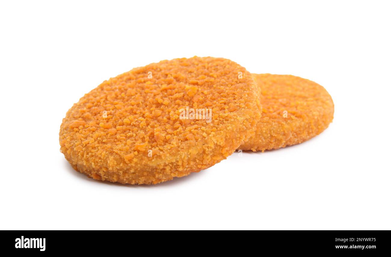 Uncooked breaded cutlets on white background. Freshly frozen semi ...