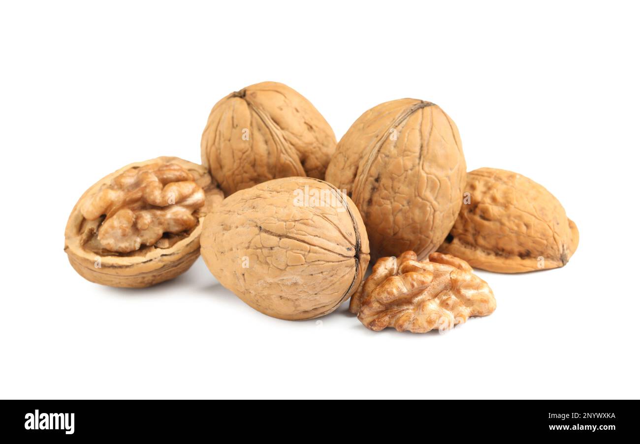 Pile of ripe walnuts on white background Stock Photo - Alamy