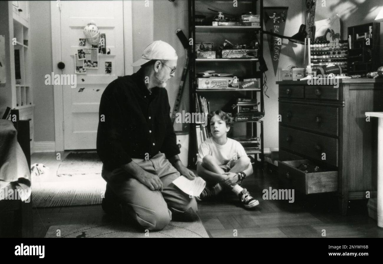 American actor, puppeteer and filmmaker Frank Oz and child actor Hal Scardino on the set of The ...