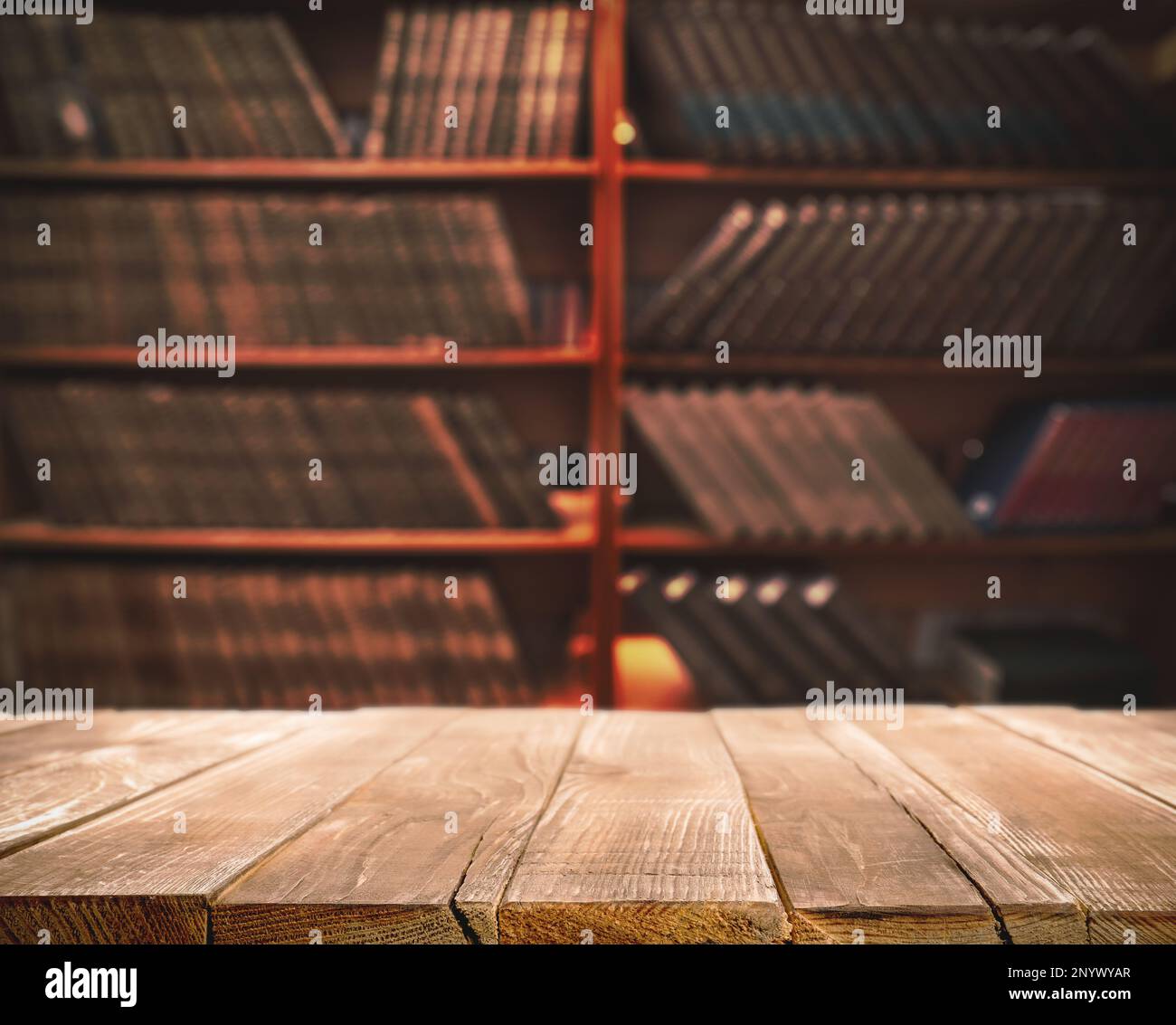 Empty wooden table in library. Space for design Stock Photo - Alamy