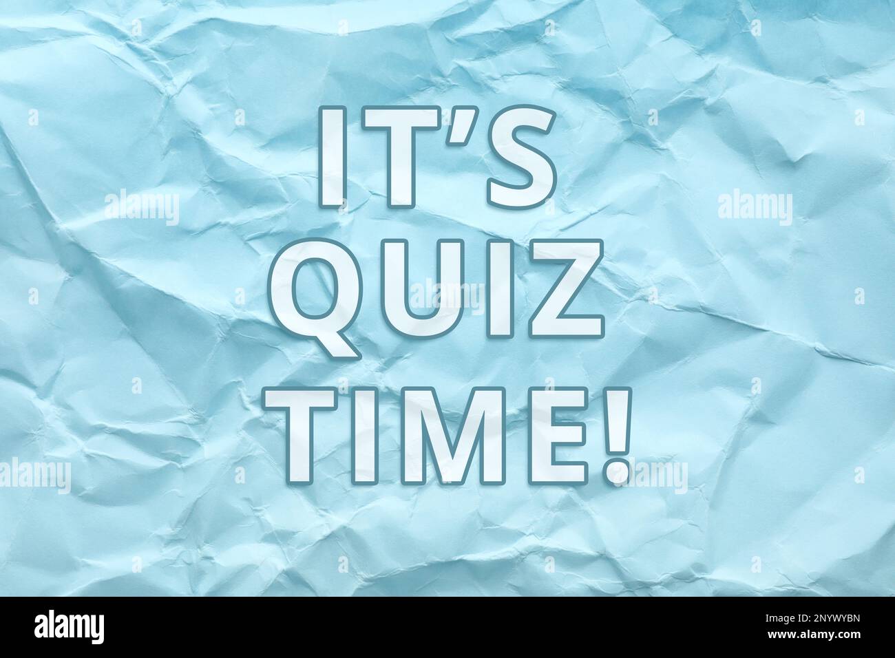 Phrase IT'S QUIZ TIME on crumpled light blue paper Stock Photo - Alamy
