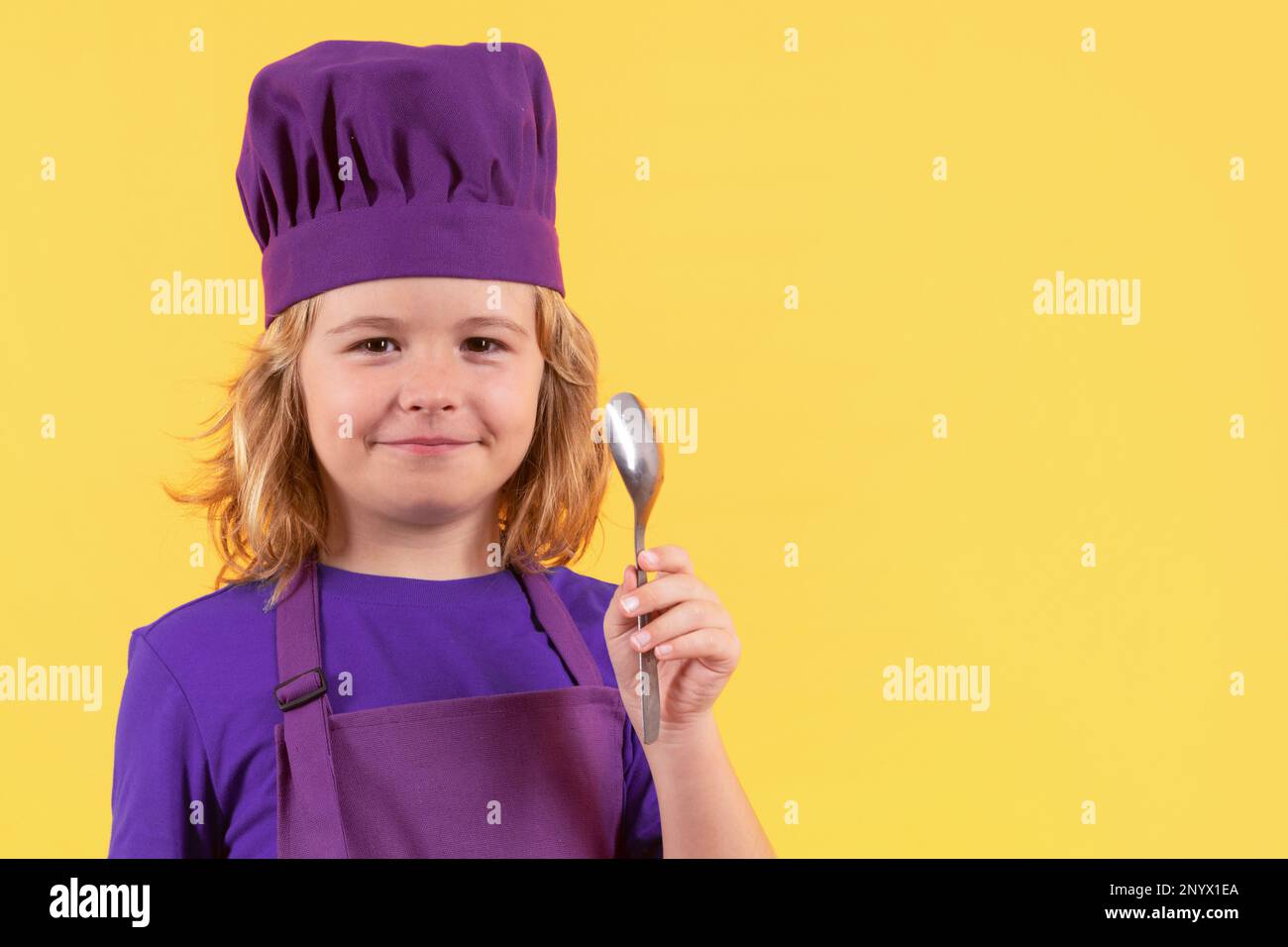 Funny kid chef cook with spoon, studio portrait. Portrait of little ...