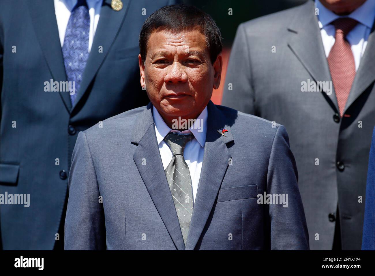Philippine President Rodrigo Duterte poses for a family photo with ...