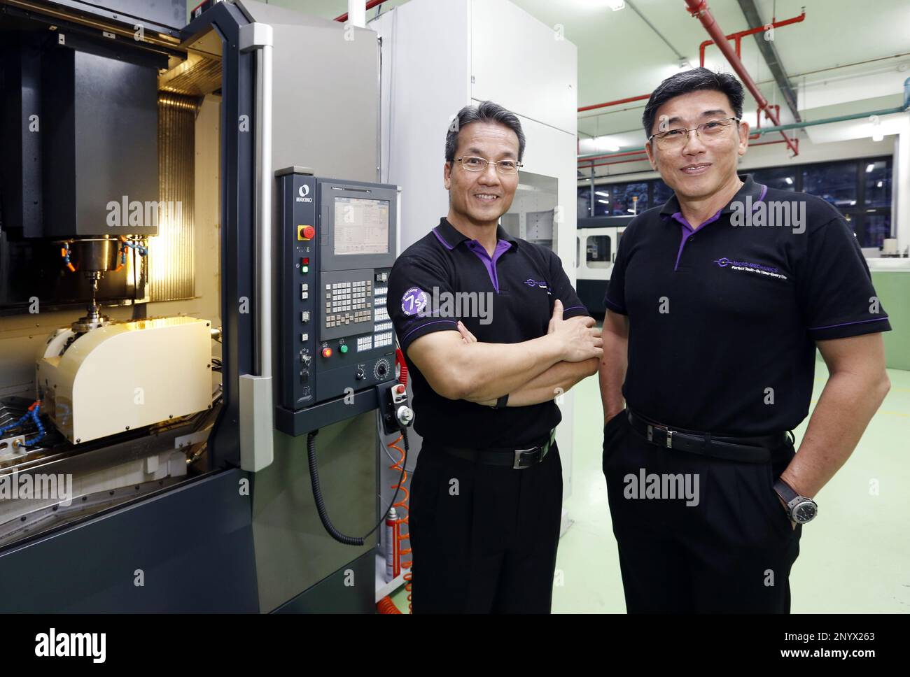 (L-R) Chow Kam Wing, CFO, Micro-Mechanics Pte Ltd ; Low Ming Wah ...