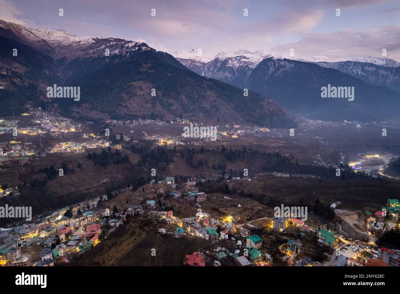 aerial drone shot of manali hill station blue hour evening with ...