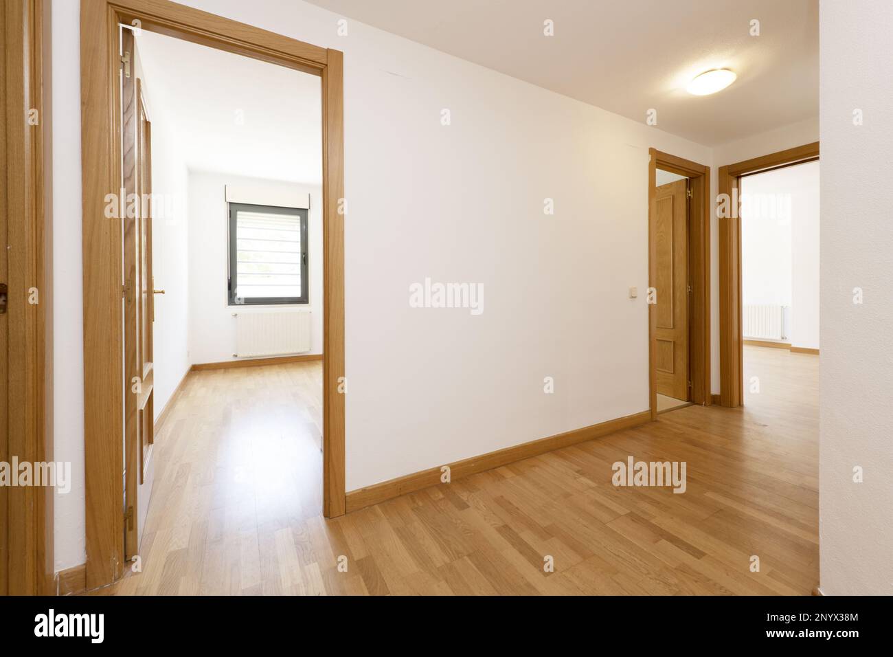 Distributor corridor of a house with floating oak wood floors and ...
