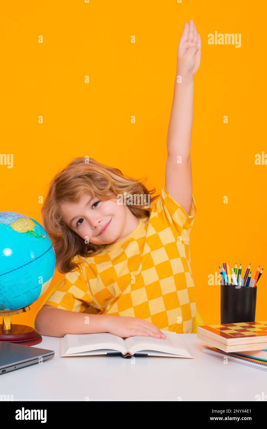 School child raising hands, willing to answer question. Child from ...