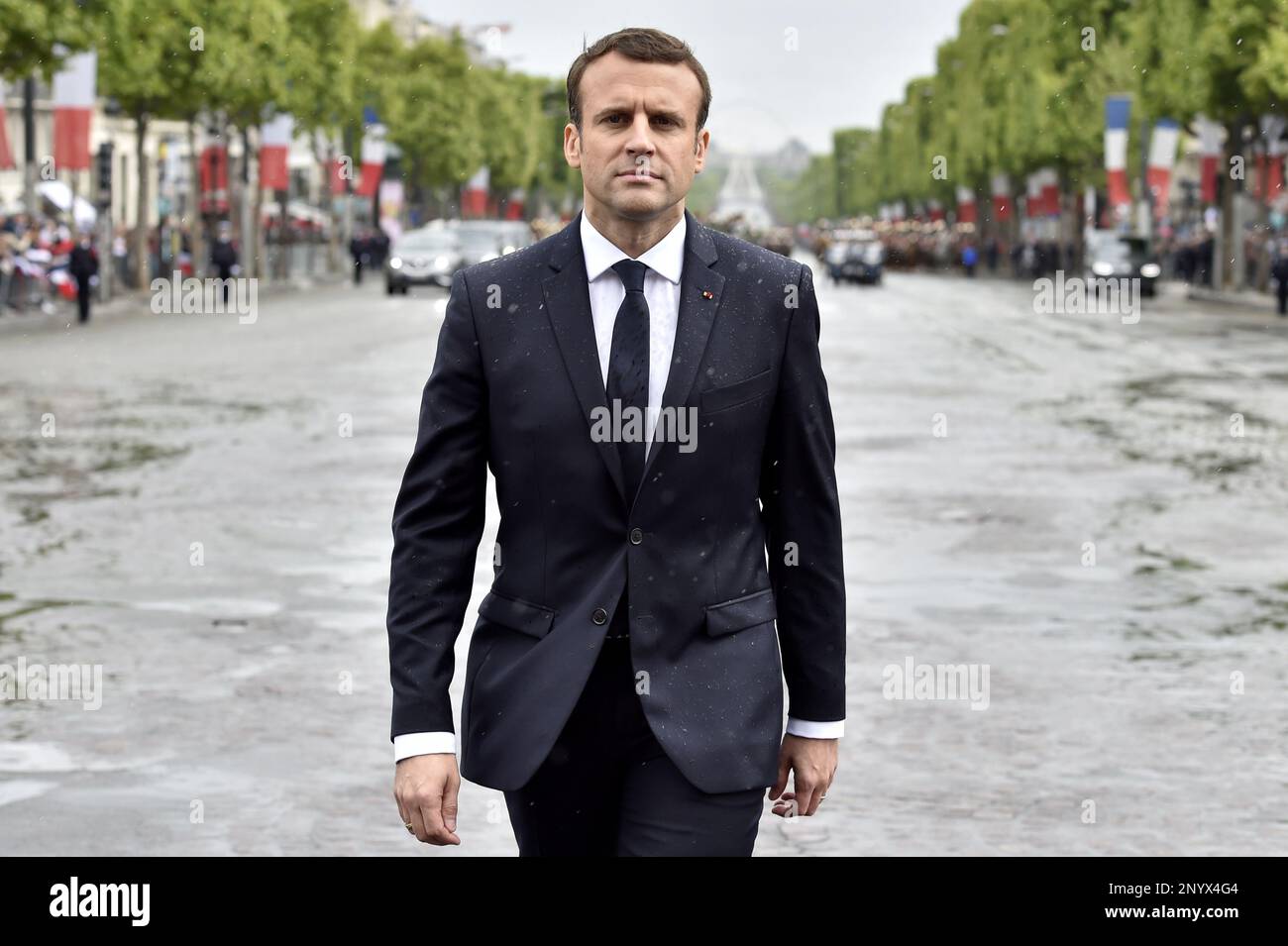 French President Emmanuel Macron arrives to lay a wreath of flower on ...