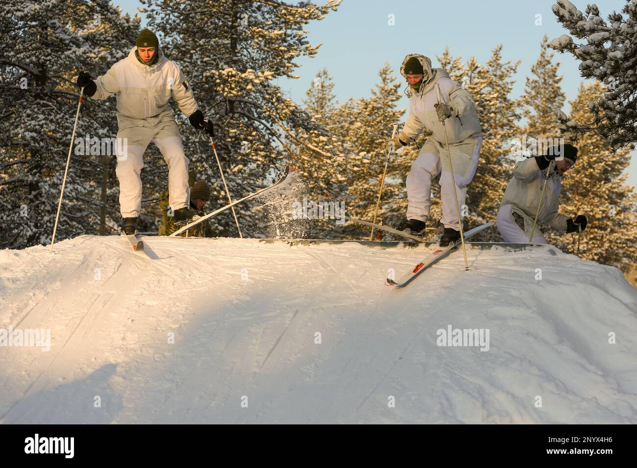 Finnish army soldiers progress through the ski obstacle course during ...
