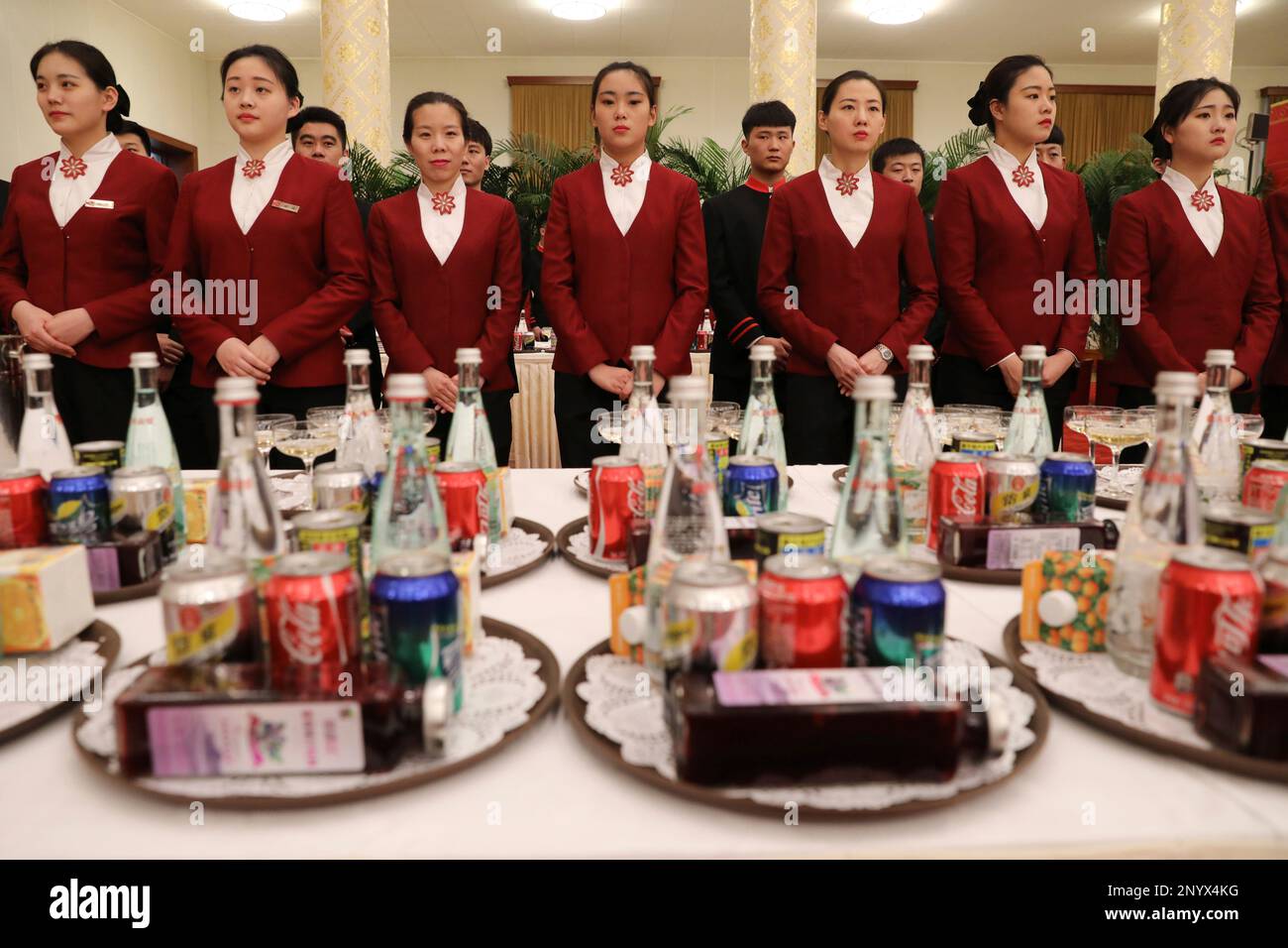 Chinese waitresses wait ahead a welcome banquet for the Belt and Road ...