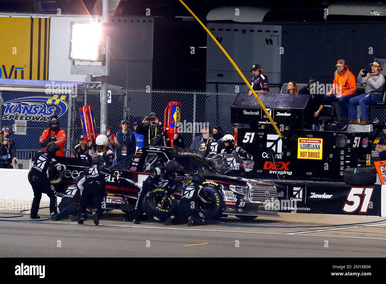 Kyle Busch, Cessna Toyota Tundra makes a pit stop during the NASCAR ...