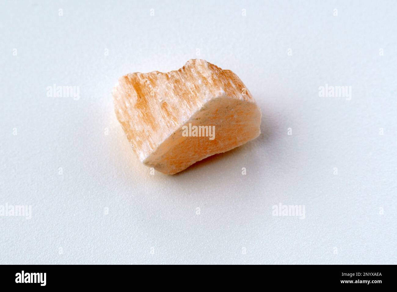 Red Gypsum stone mineral, white background, close-up, black background ...