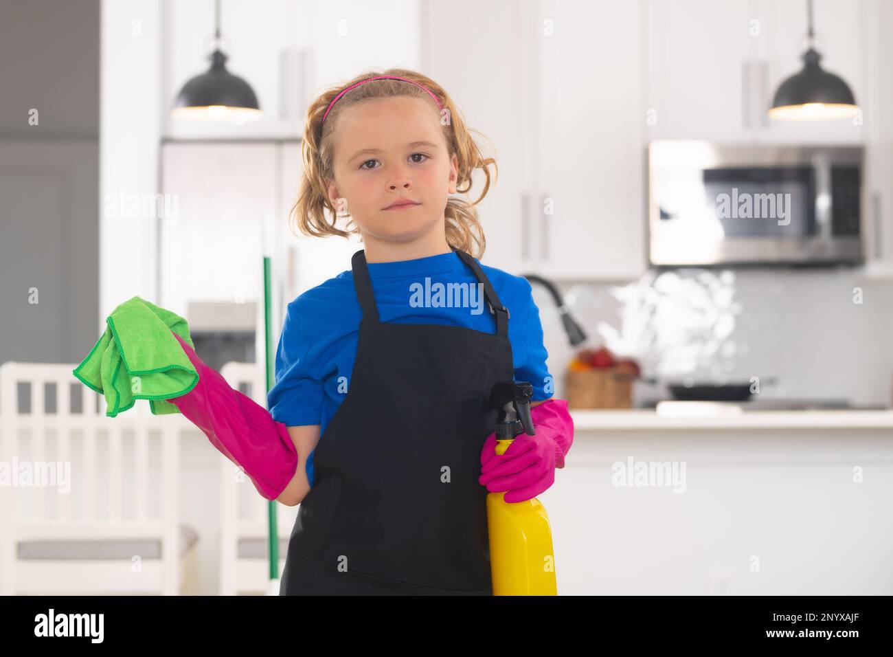 Cleaning house. Little kid cleaning at home. Child doing housework ...