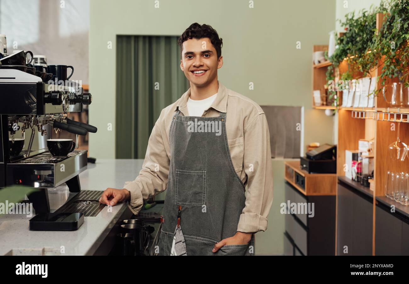 Portrait cheerful barista in hi-res stock photography and images - Alamy