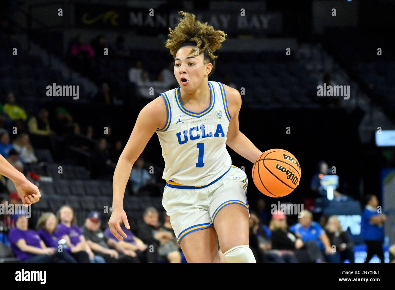 UCLA guard Kiki Rice handles the ball during the second half of an NCAA ...
