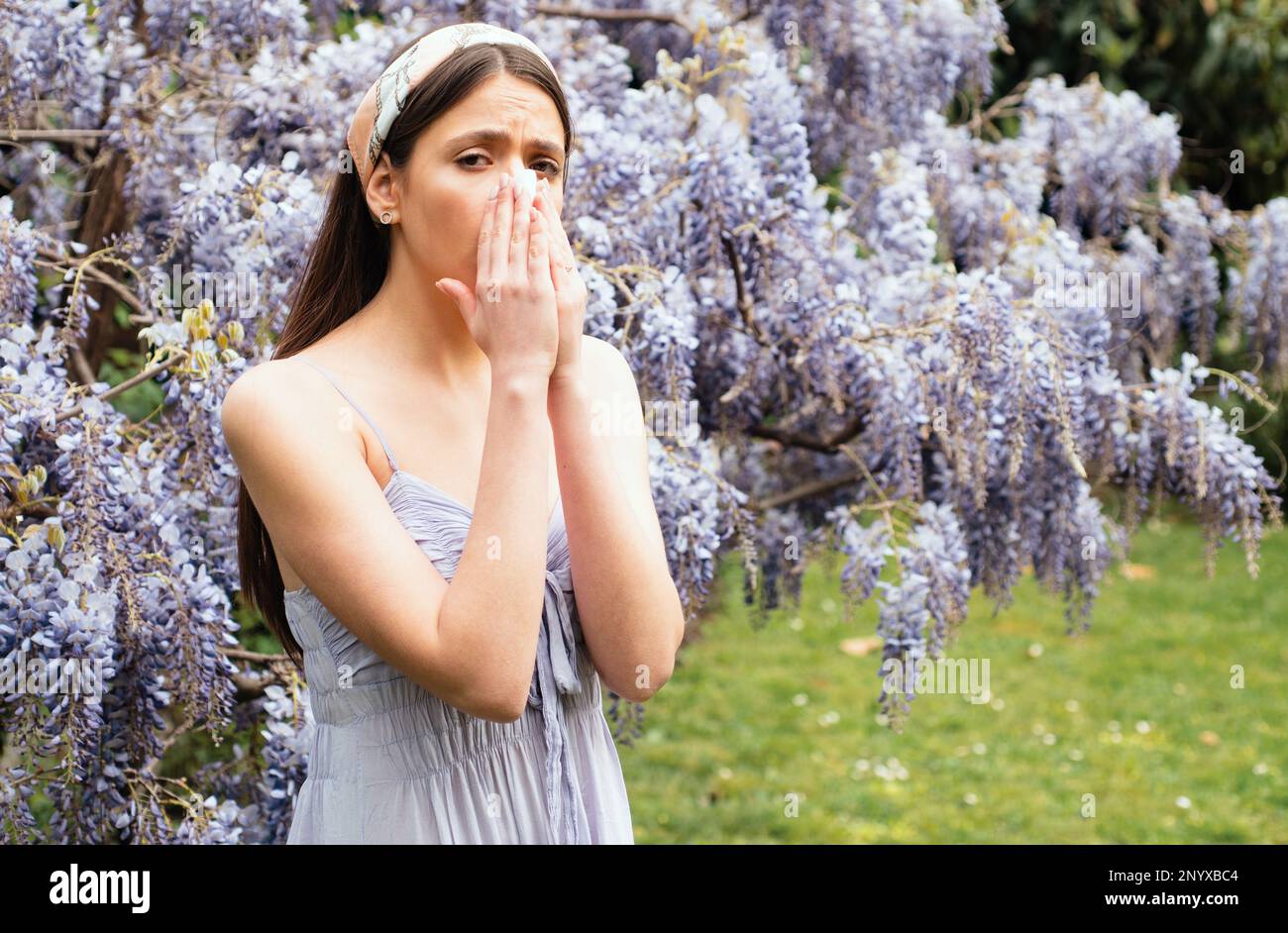 Spring allergy. Girl with nose sneezing. Allergic symptom concept ...