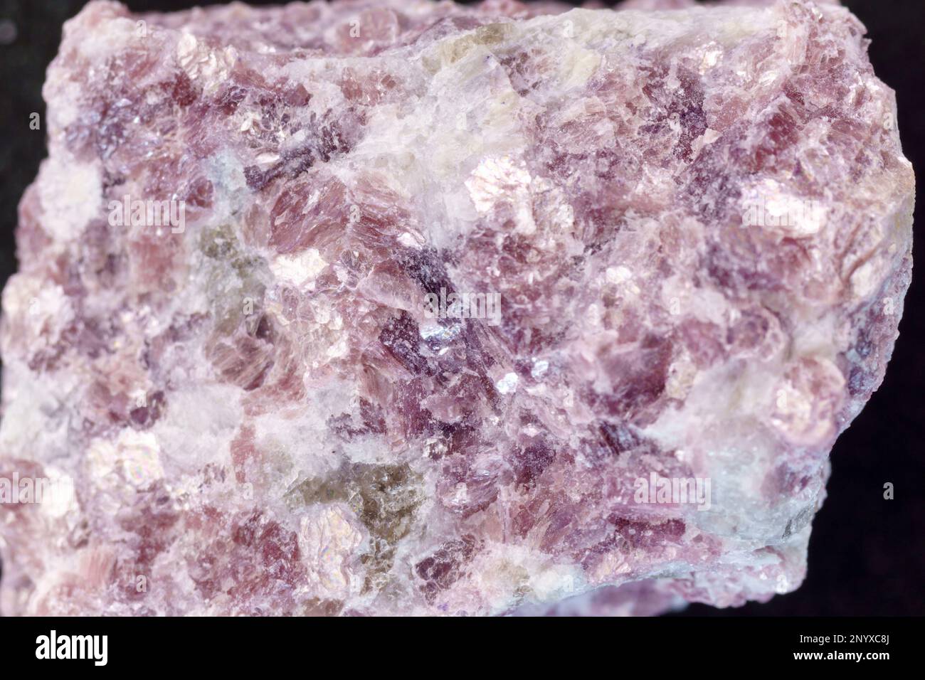 Lepidolite stone macro, being a secondary source of lithium, used in ...