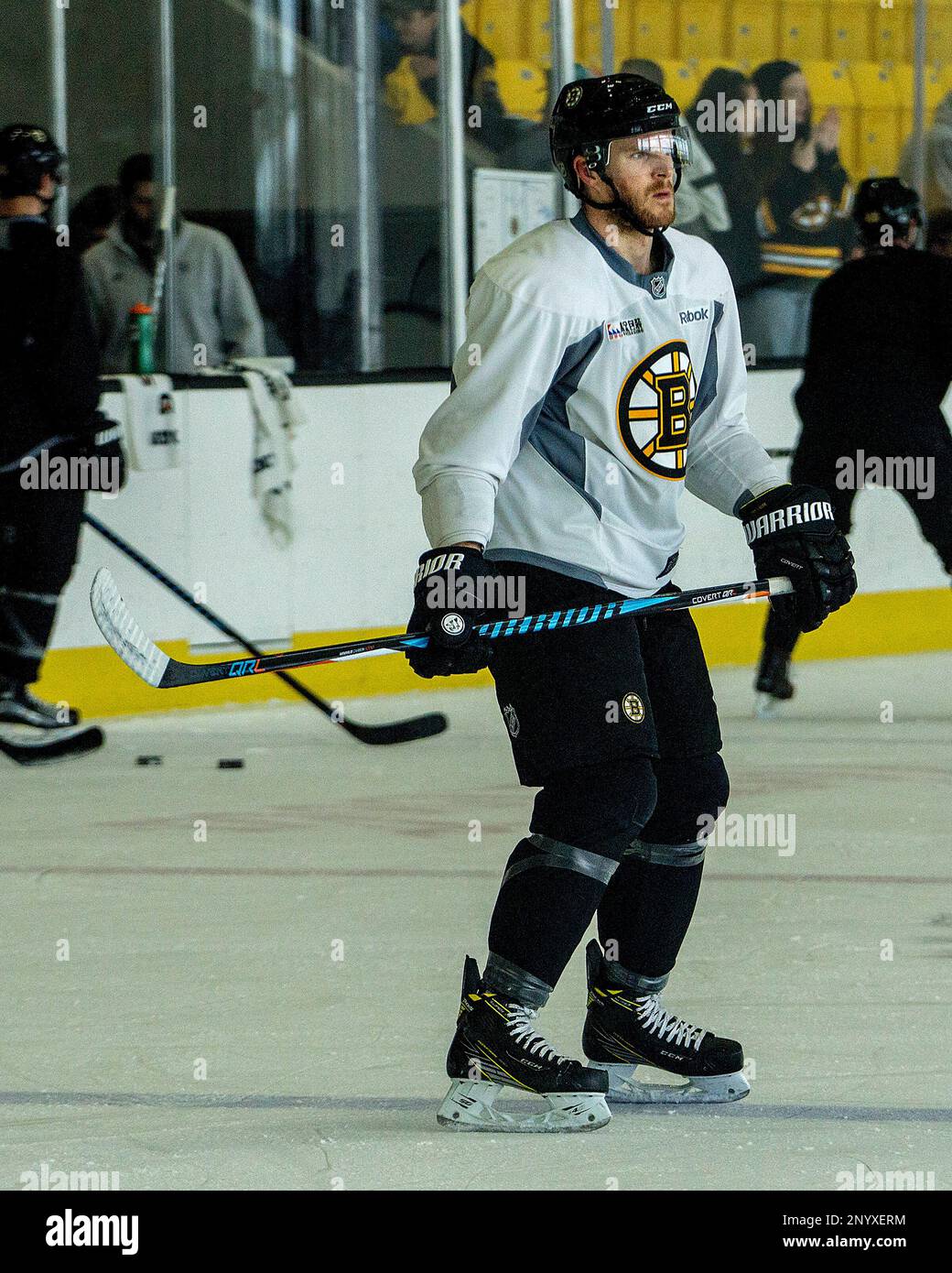 Boston Bruins defenseman Kevan Miller (86) watches a drill during ...
