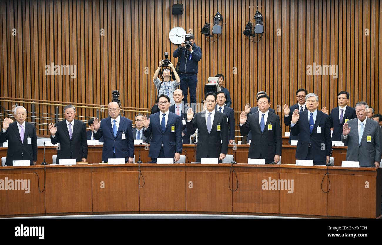 FILE - In this Dec. 6, 2016 file photo, from left, CJ Group Chairman ...