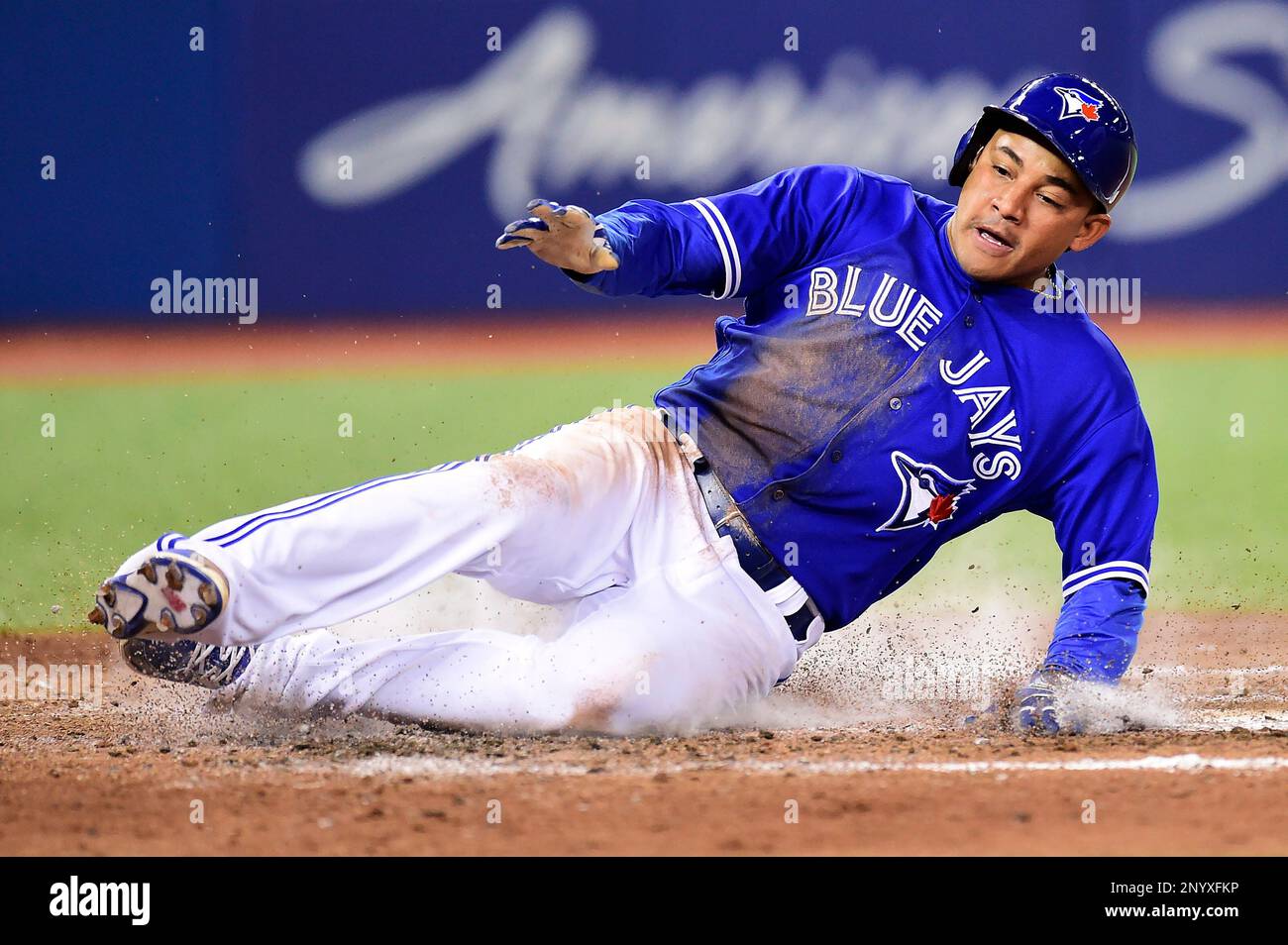 Toronto Blue Jays' Ezequiel Carrera scores on a Justin Smoak single ...
