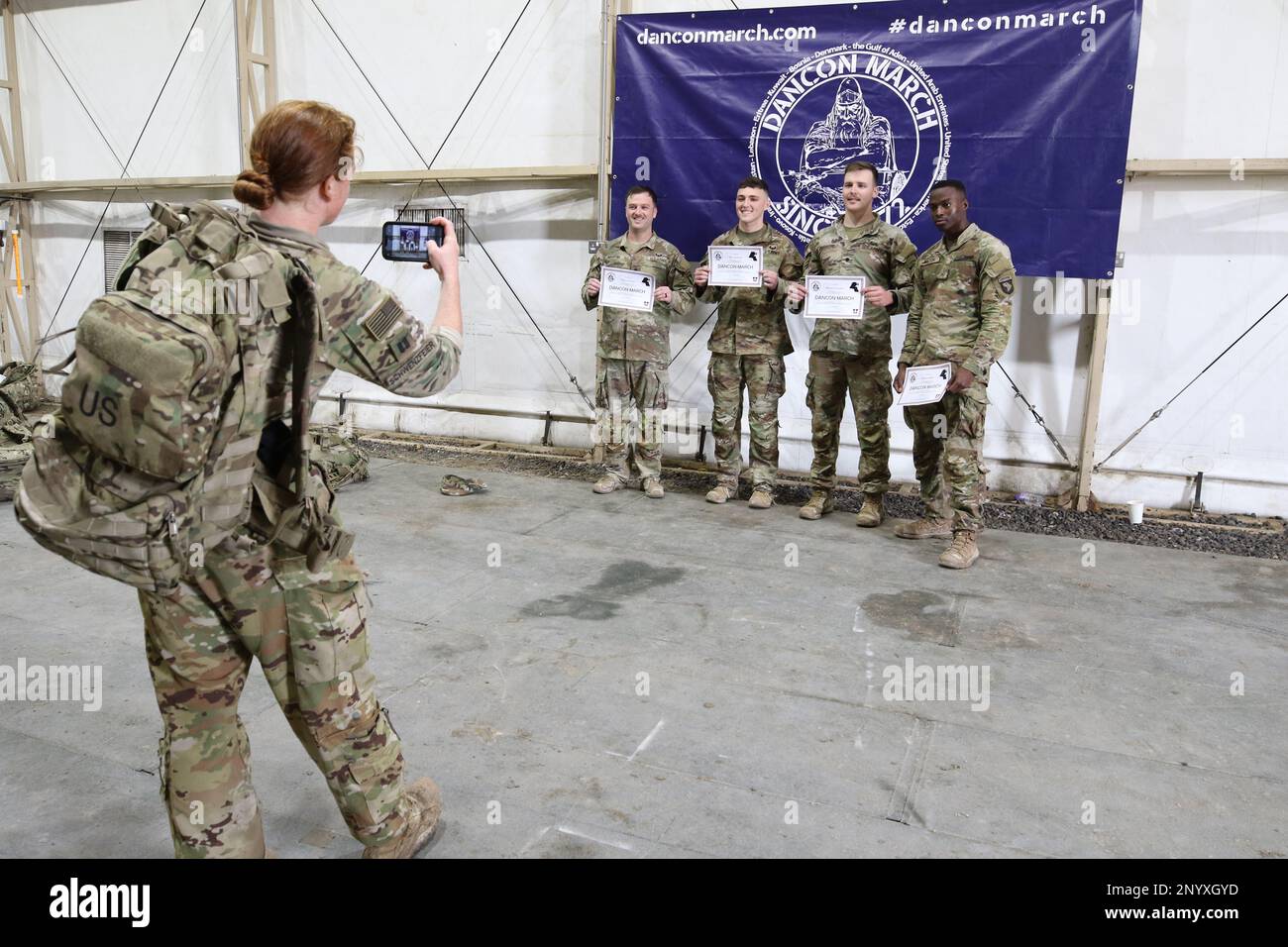 U.S. Soldiers pose for photos after completing the Danish Contingent ...