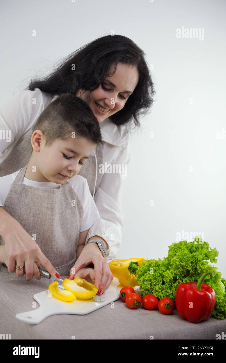 cooking courses for children mom teaches to cut vegetables with knife ...