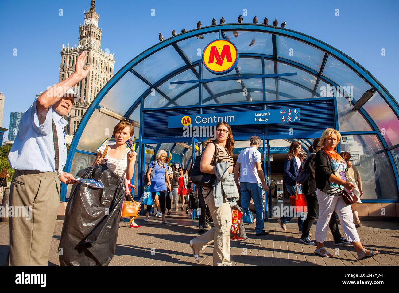 Plac Defilad square, exit of subway, Centrum station, in background ...