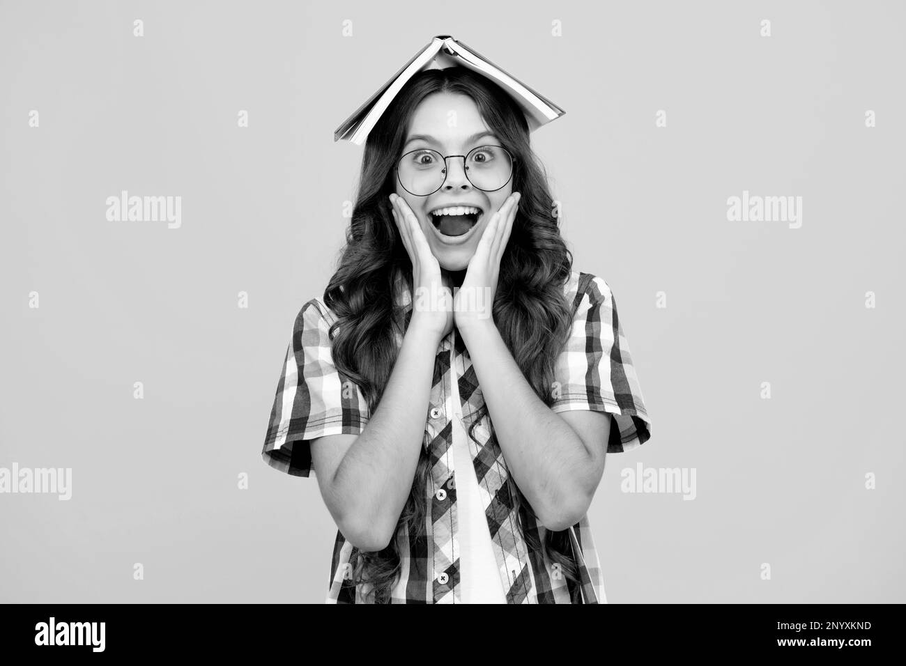Amazed teen girl. Teenage school girl with books. Schoolgirl student ...