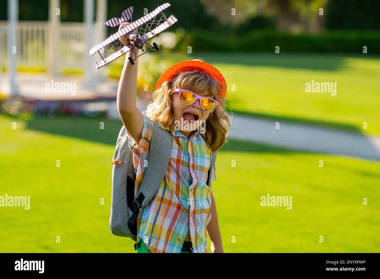 Child playing. Kid playing with toy airplane and dreaming future. Happy ...