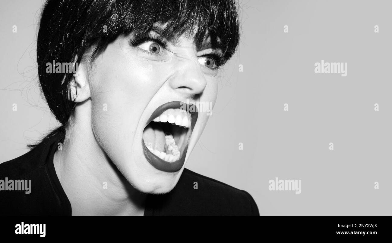 Woman shouting and screaming loud with open mouth. Human emotions ...