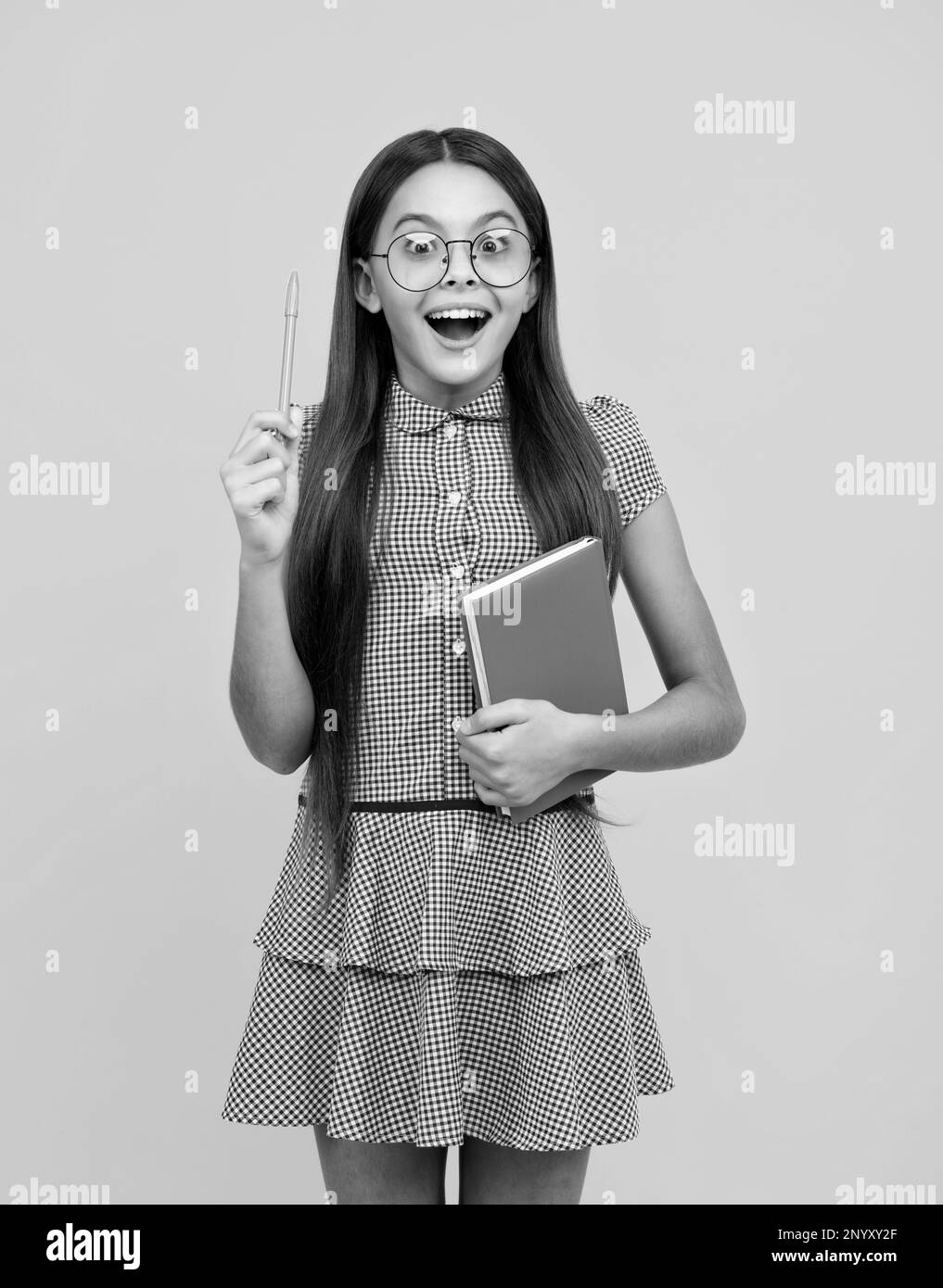 Amazed teen girl. Teenage school girl with books. Schoolgirl student ...