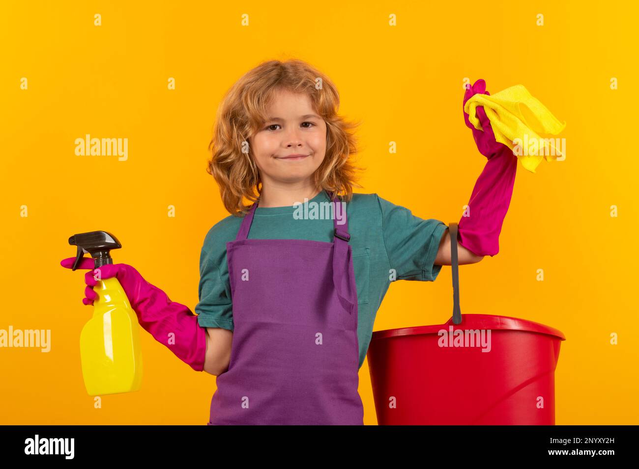 Cleaning house. Studio isolated portrait of child mopping house ...