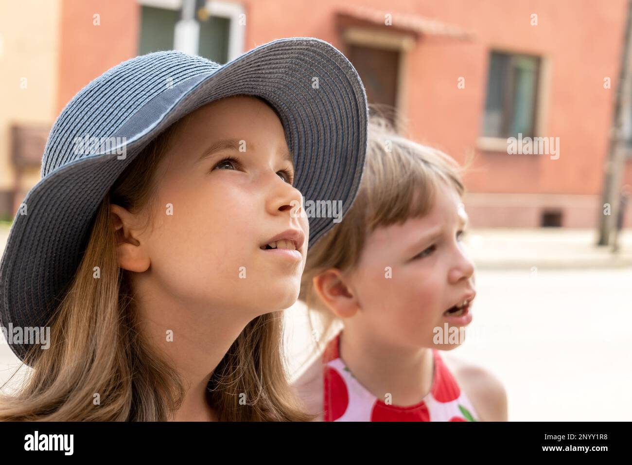 Two elementary school age girls Caucasian European kids outdoors ...