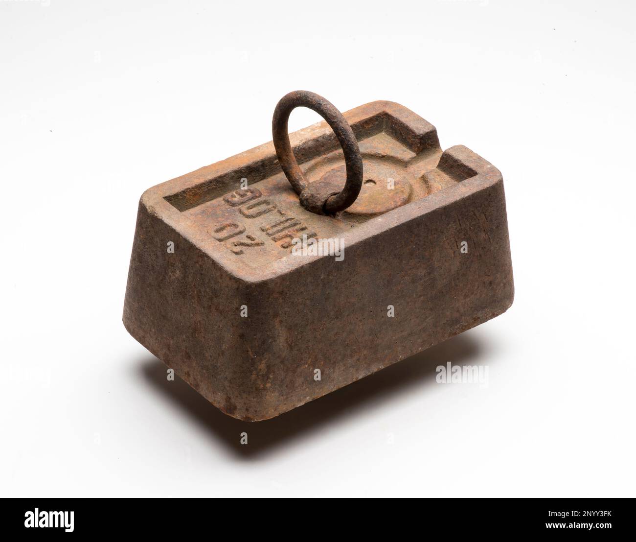 old rusty weight isolated on white background Stock Photo - Alamy