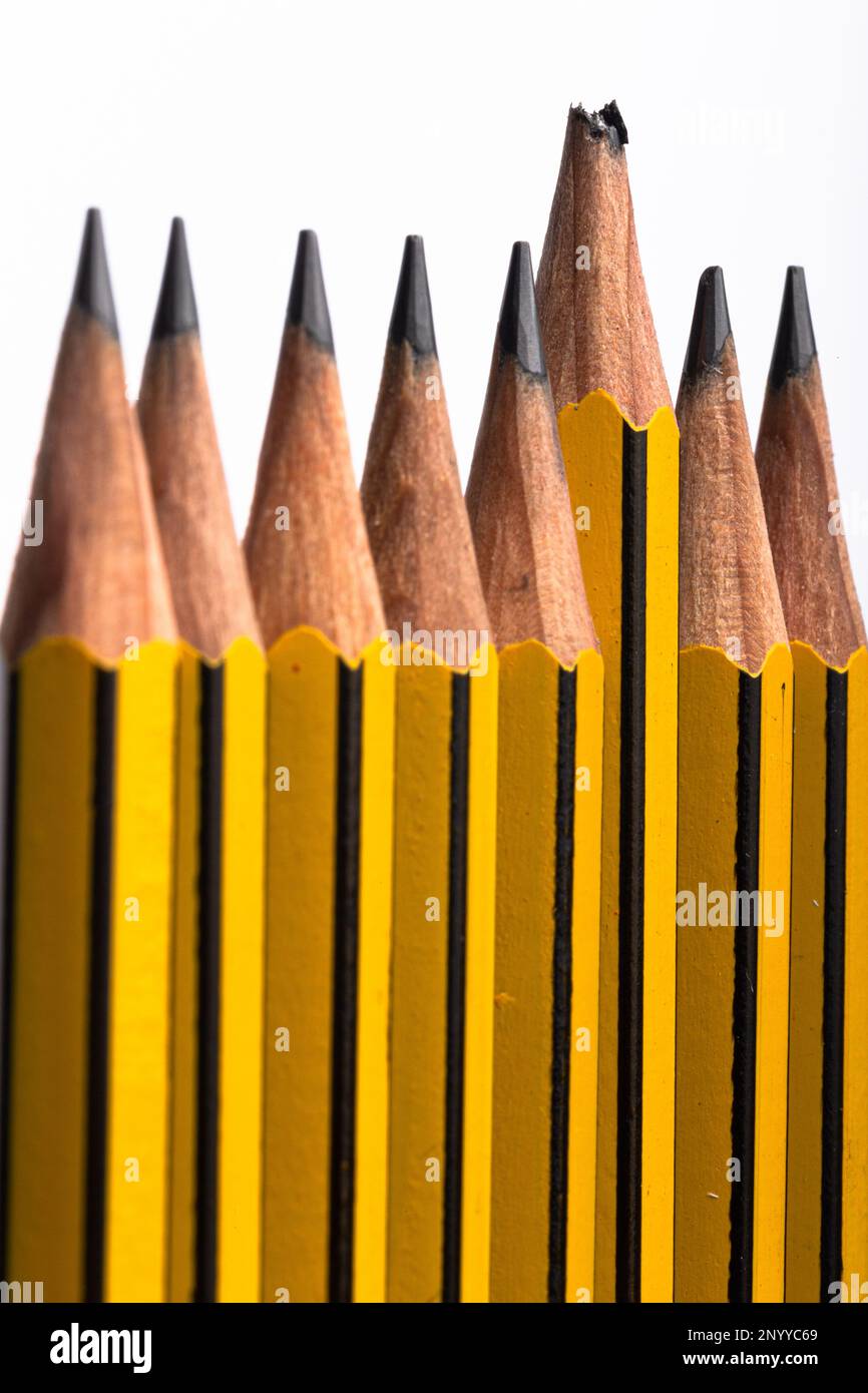 Broken Pencil Among a Row of Perfectly Sharpened Ones Stock Photo - Alamy