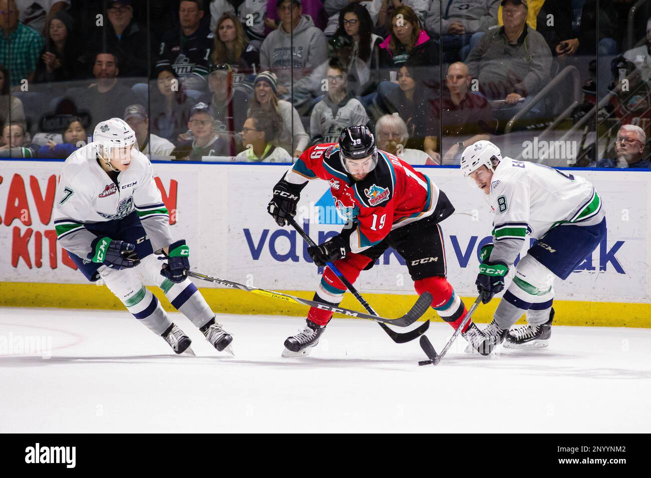 Kelowna Rockets forward Dillon Dube (19) skates the puck between ...