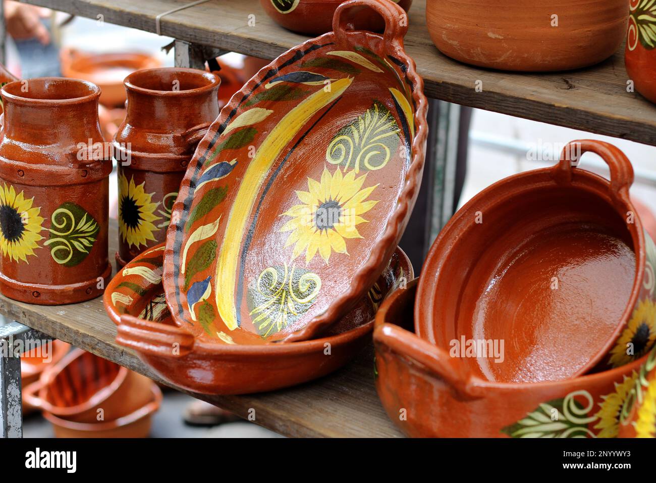 Various handmade clay pot, pot, casserole and jug utensils Stock Photo ...