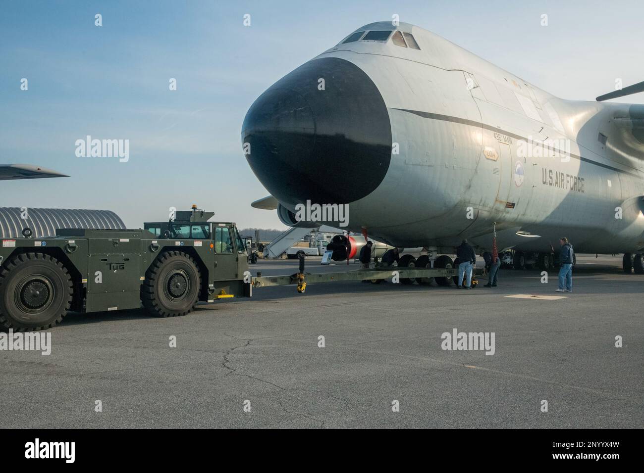 Air Mobility Command Museum staff tow a retired C-5A Galaxy to a new ...
