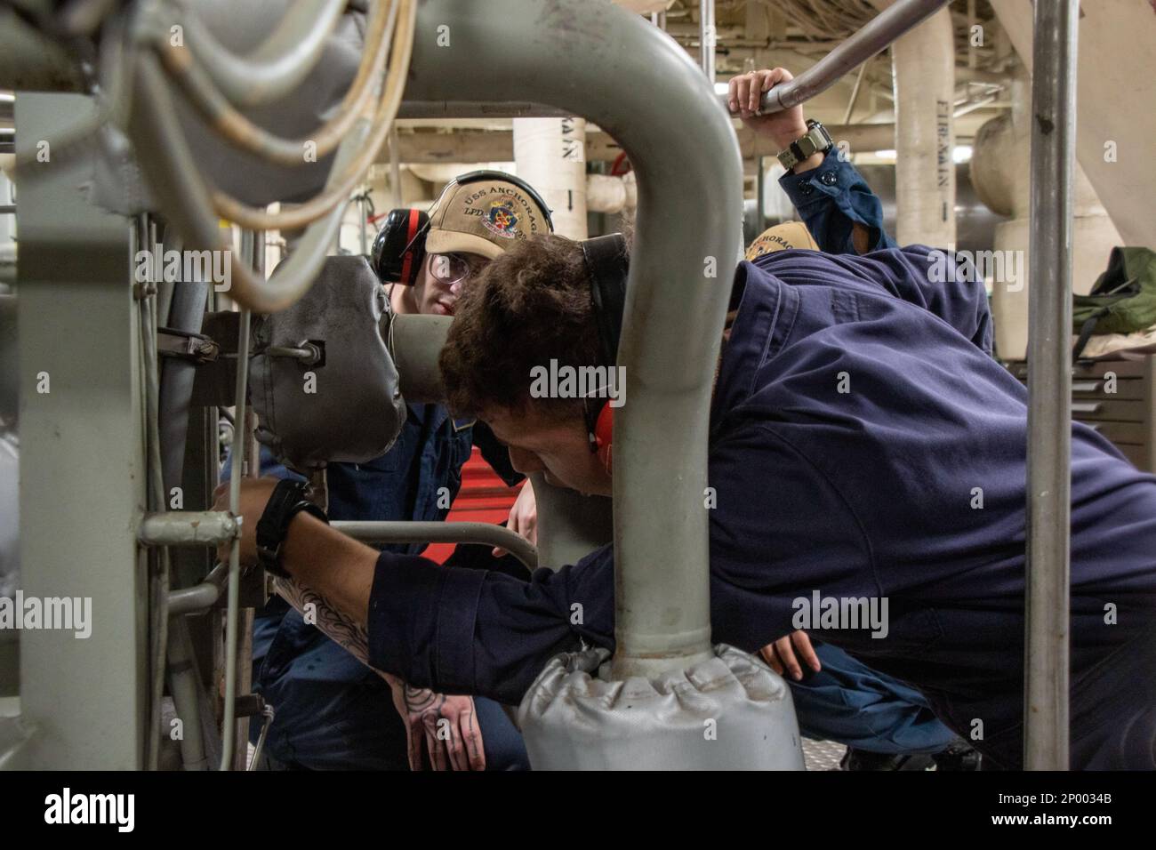 SINGAPORE (Feb. 17, 2023) – Engineman 3rd Class Lucas Anderson, front ...
