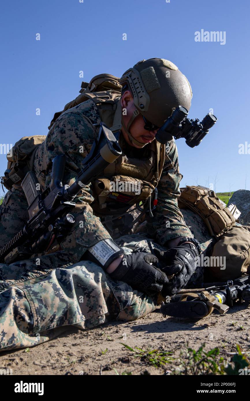U.S. Navy Petty Officer 2nd Class Antonio Cordova, a hospital corpsman ...