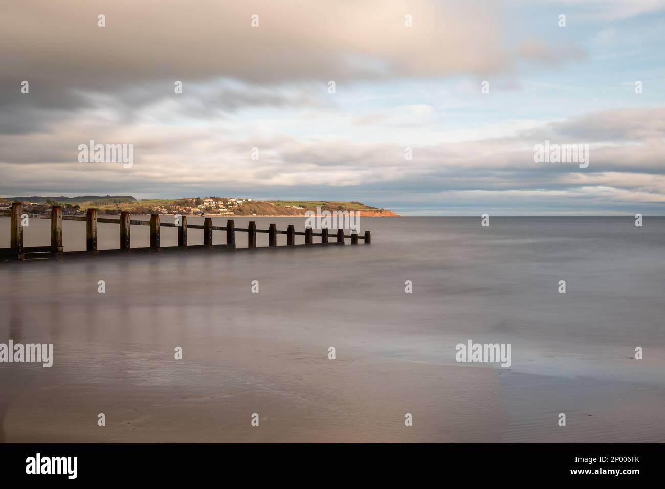 Landscape photo of a groyne in the sea at Dawlish Warren nature reserve ...